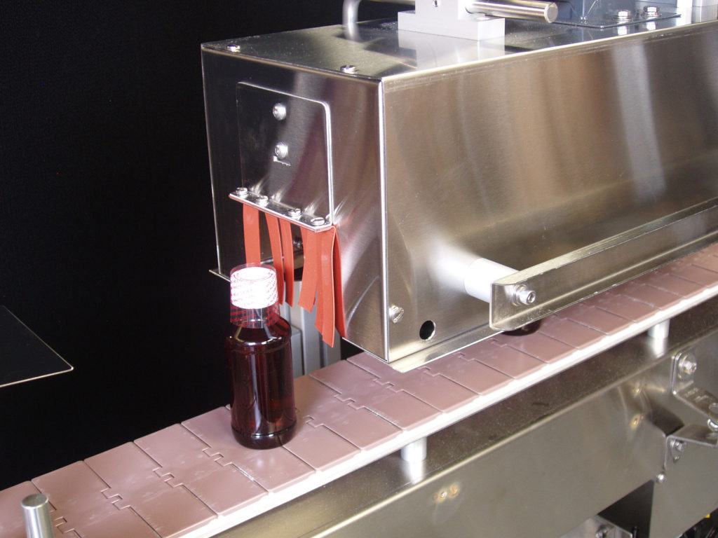 New Heat Shrink Tunnel Automatically Secures Tamper-Evident Bands